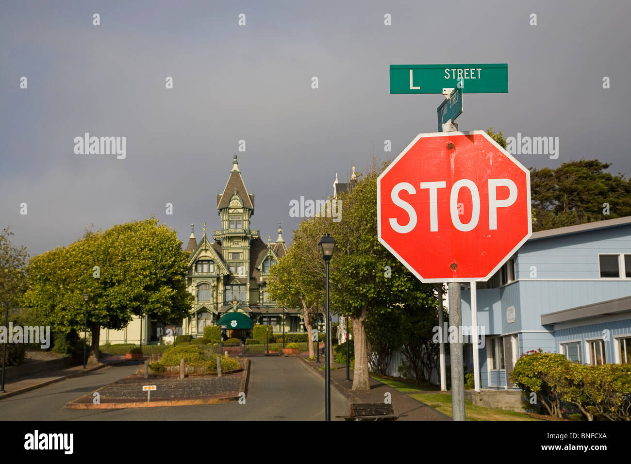 A stop sign near the Ingomar Club, or Carson Mansion, a Queen Anne ...