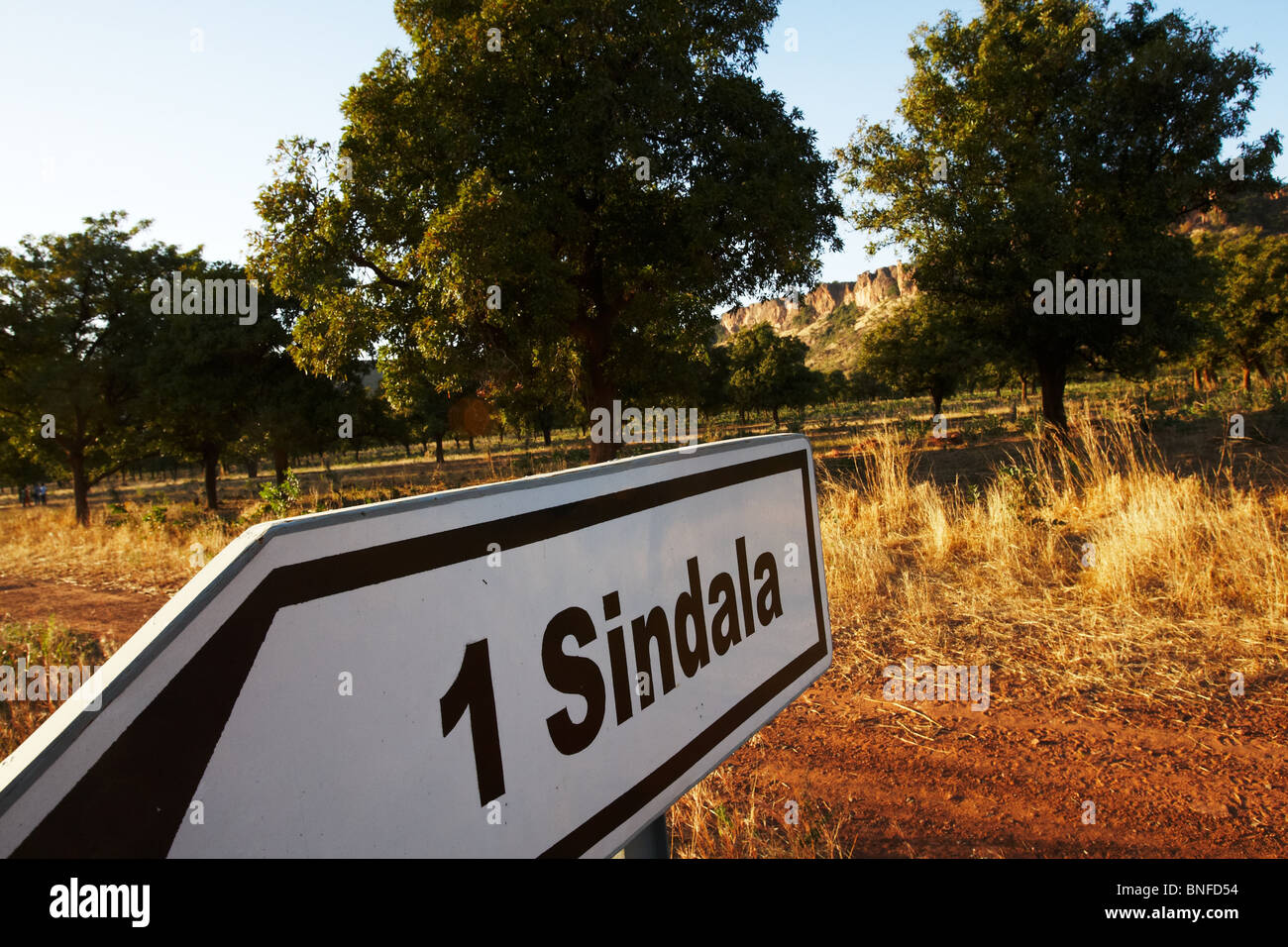 Roading indicating the direction to the village of Sindala, outside ...