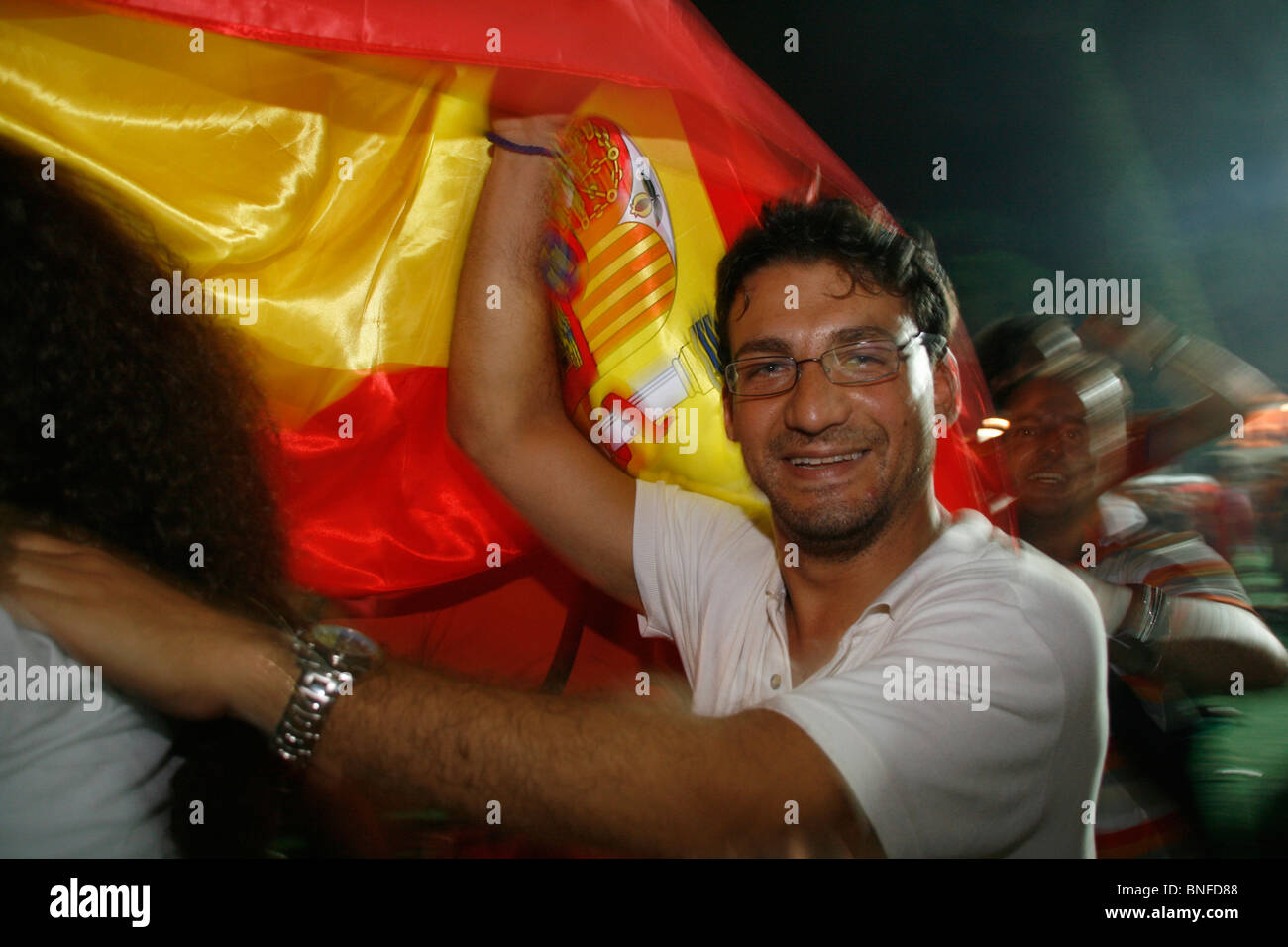 spanish supporters celebrating the victory over holland in the world ...