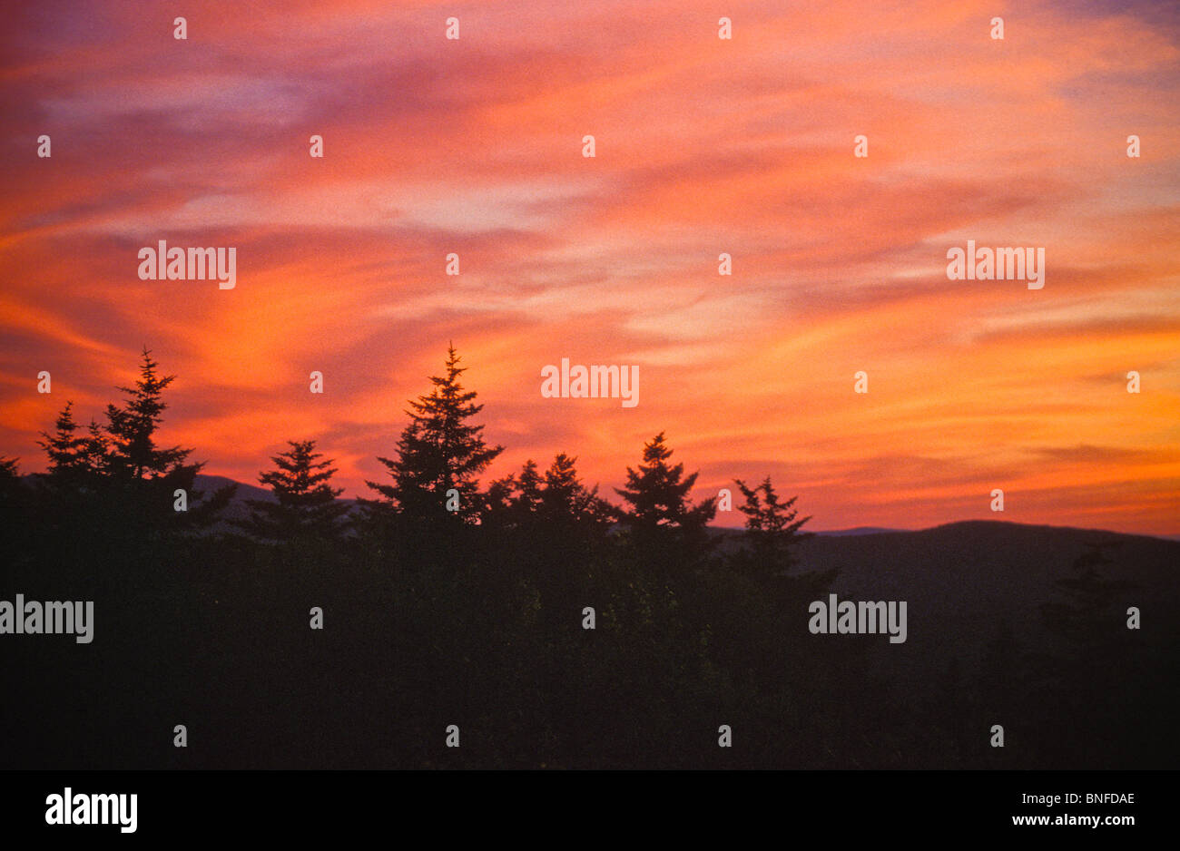 cloudy skies bright red sunset copy space Stock Photo - Alamy