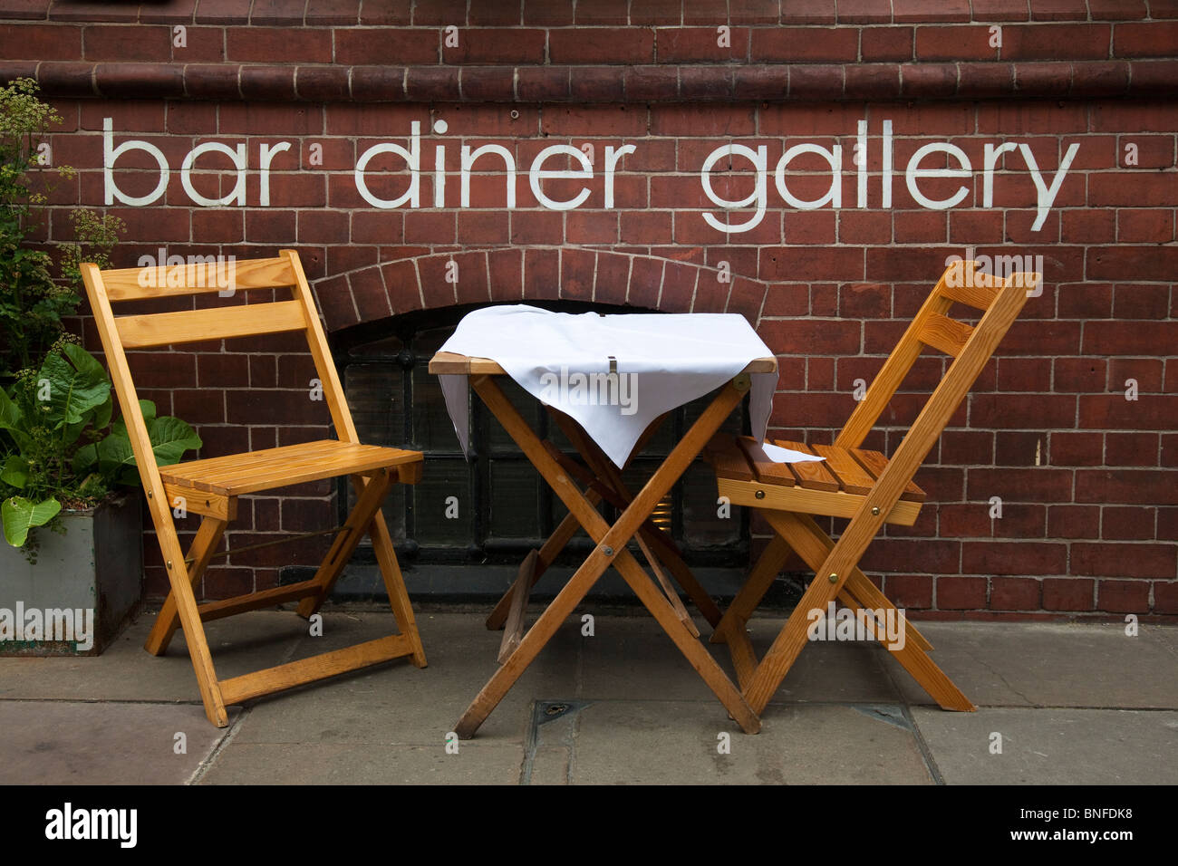 Table for two on street outside Bar/Diner, London, UK Stock Photo - Alamy