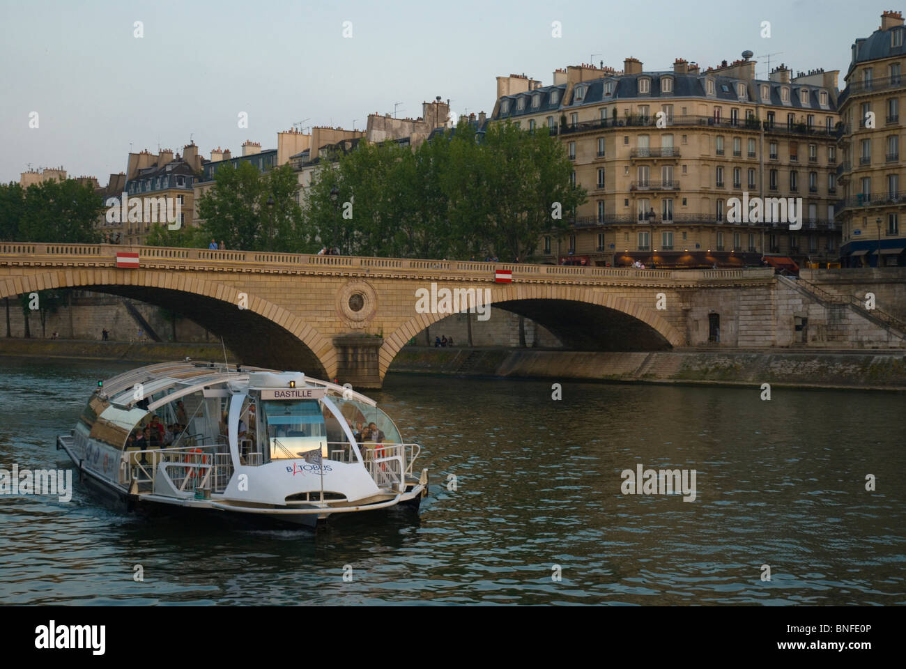 Batobus boat at Hotel de Ville on River Seine summer evening Paris ...