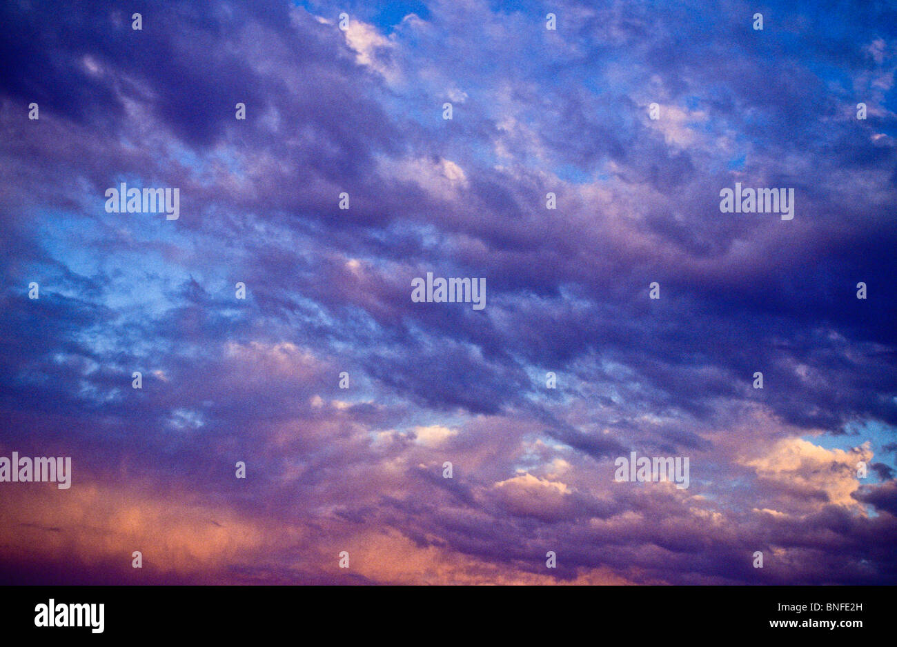 cloudy skies sunset Stock Photo - Alamy