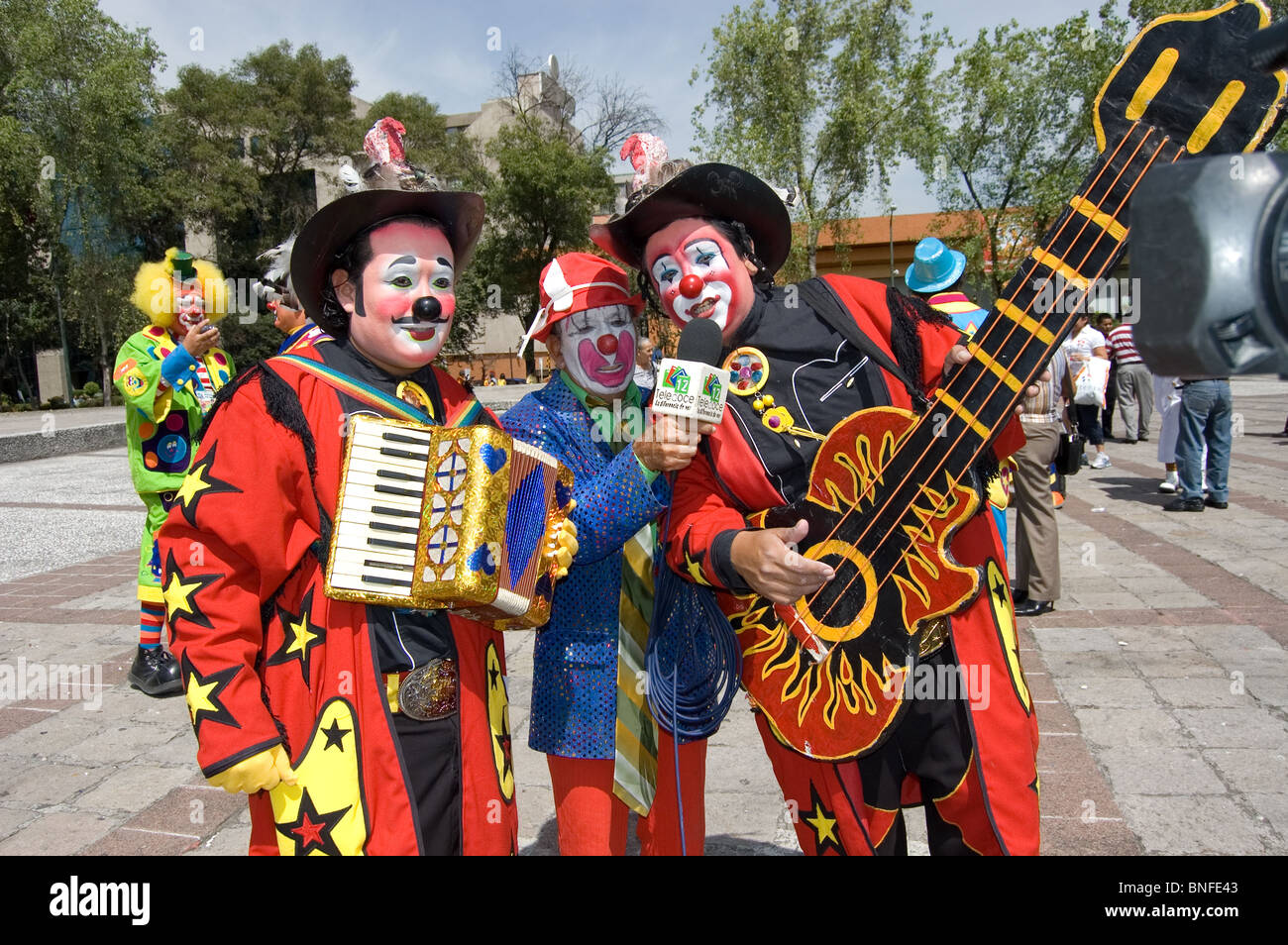 Singer clowns being interviewed during a clown parade in Mexico city ...