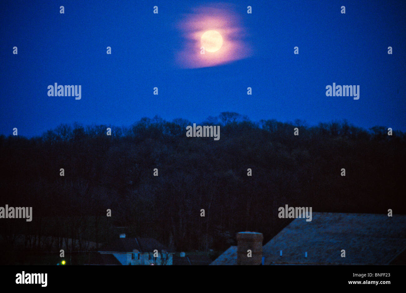 Blue sky moon glow Stock Photo - Alamy
