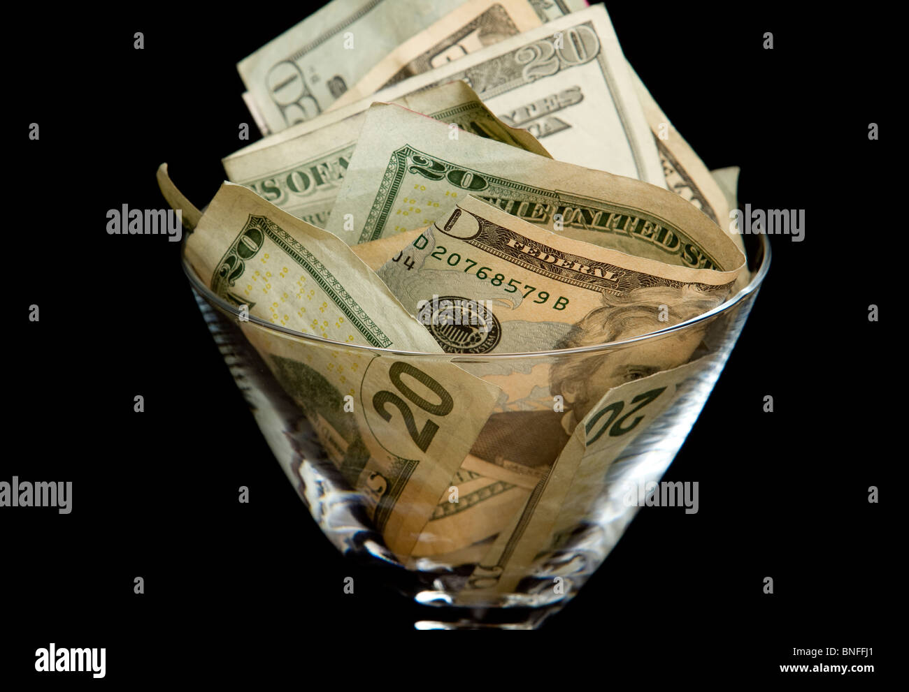 Money In A Glass Stock Photo - Alamy