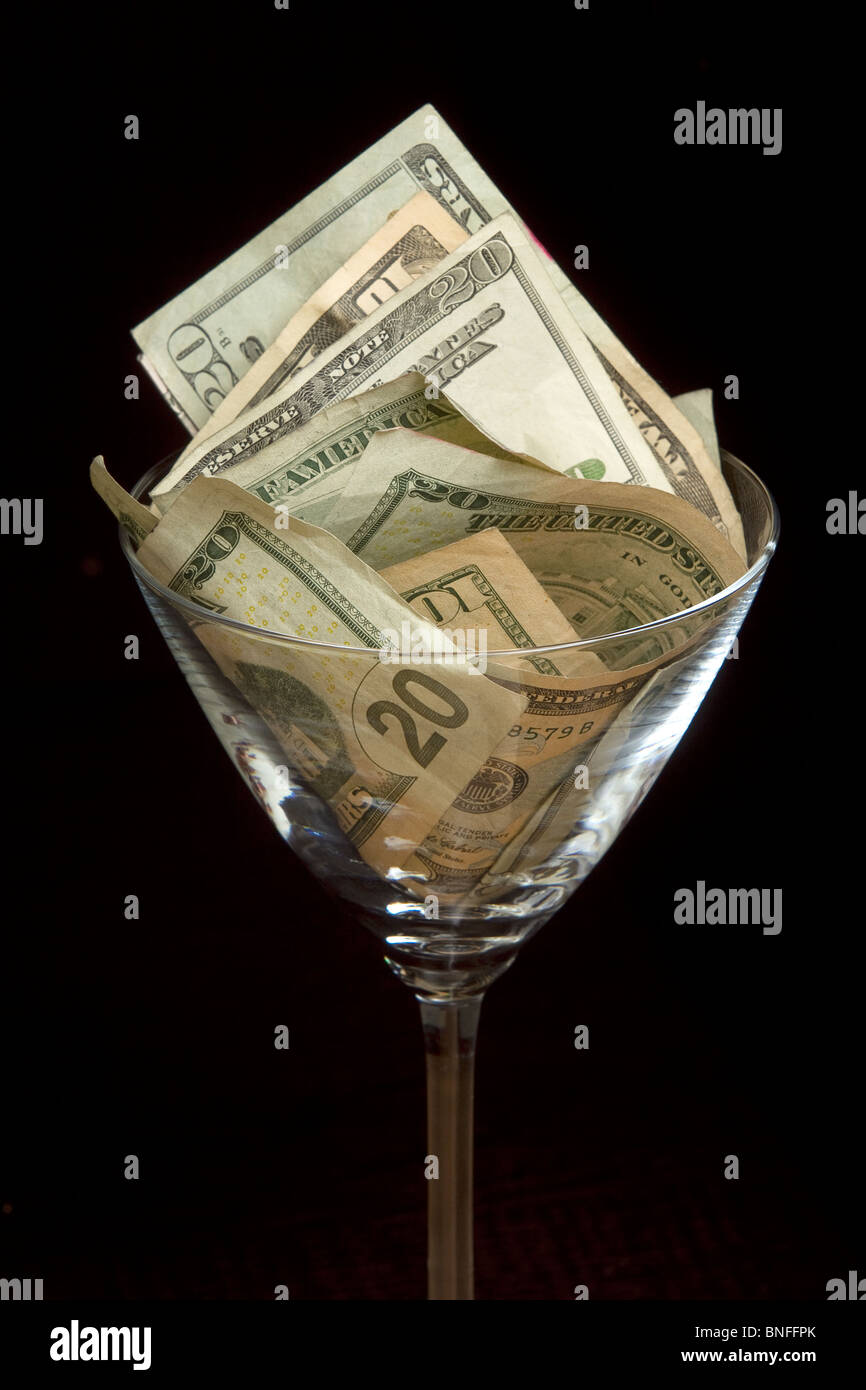Cash In A Glass Stock Photo - Alamy