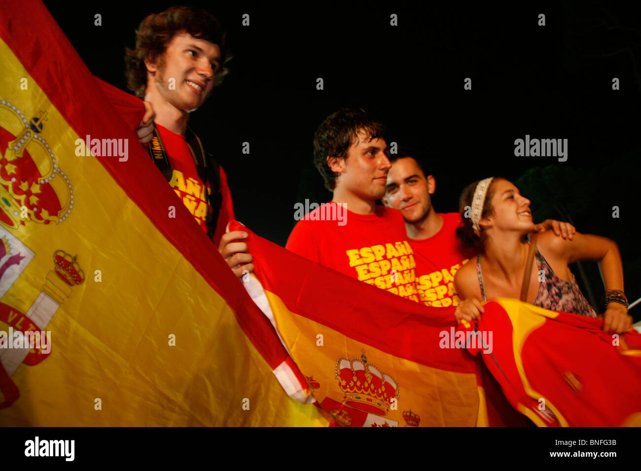spanish supporters celebrating the victory over holland in the world ...