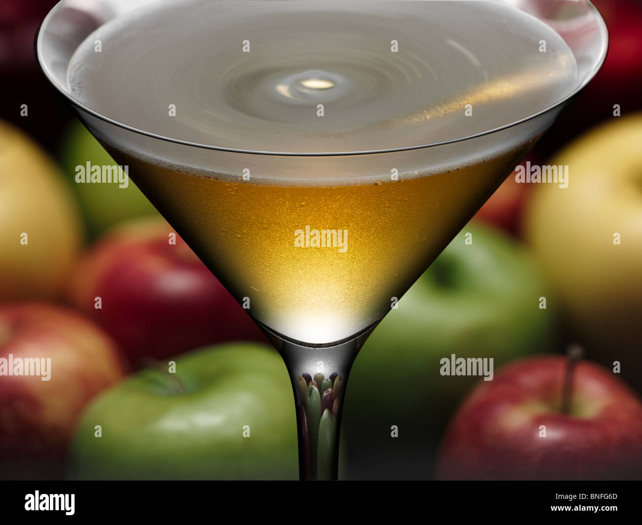 Appletini cocktail against background of mixed color apples Stock Photo ...