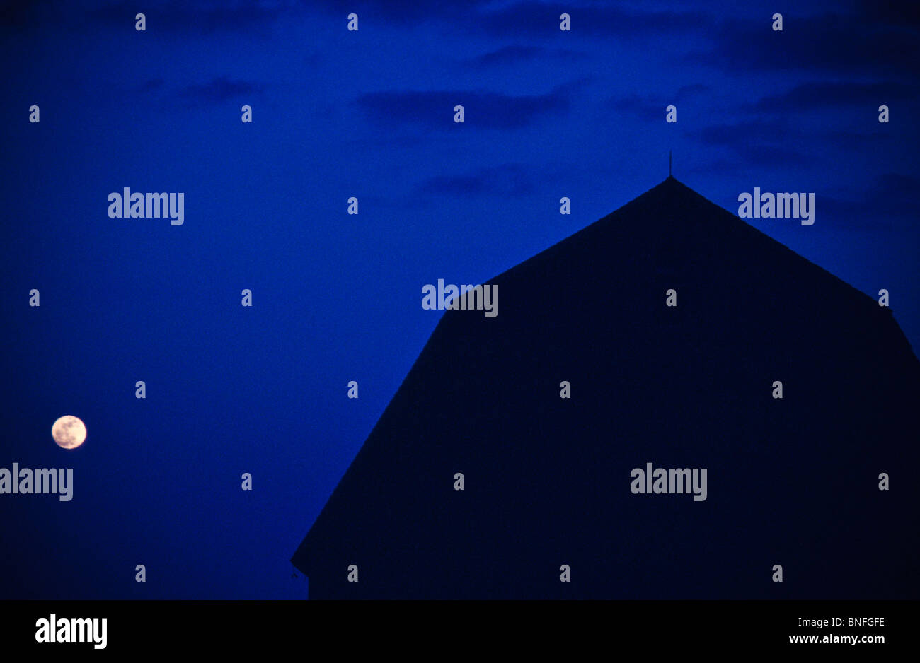 Blue sky moon glow Stock Photo - Alamy