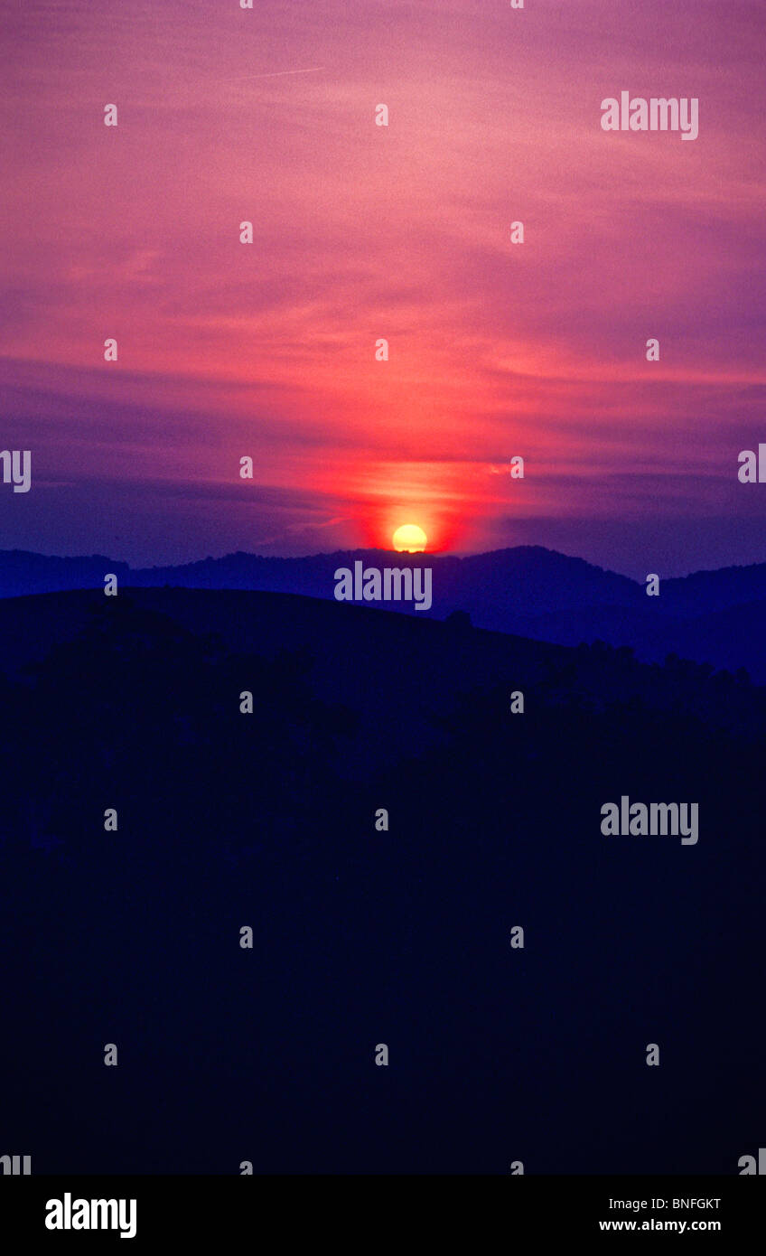 cloudy skies bright red sunset over NH mountains copy space Stock Photo ...