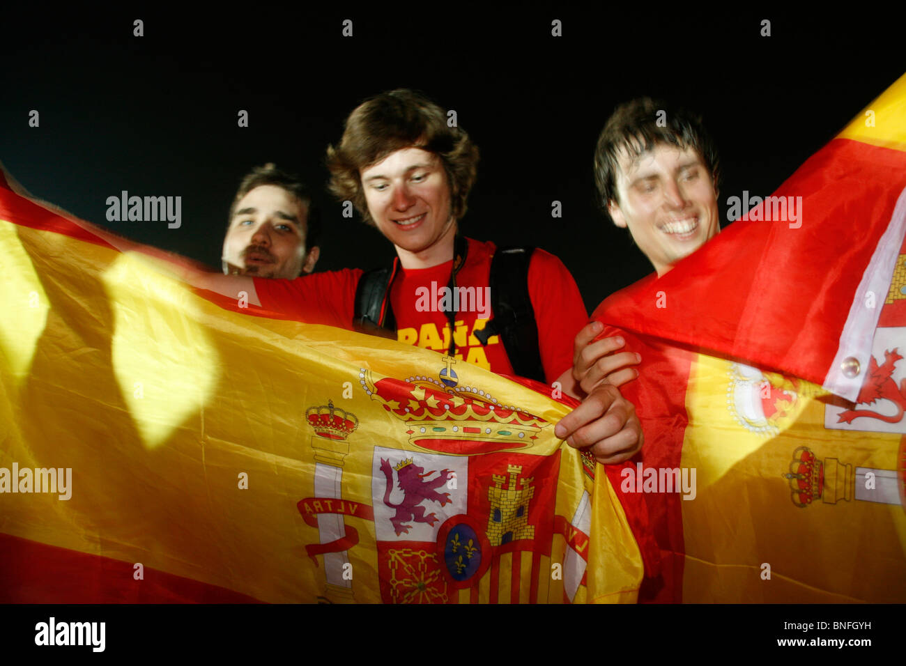 spanish supporters celebrating the victory over holland in the world ...