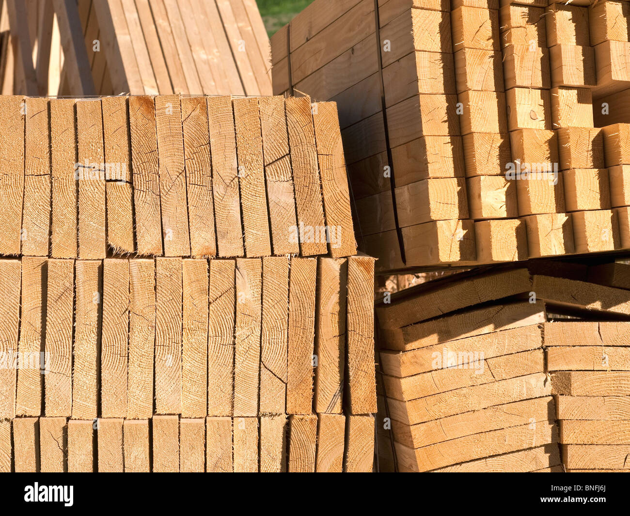 Pre-cut softwood timber planks and studs for new domestic housing ...