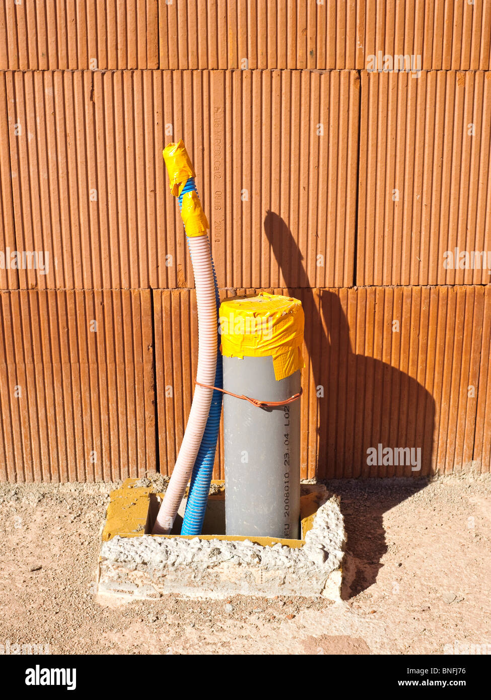 New house services pipes installed in concrete foundations - Indre-et ...