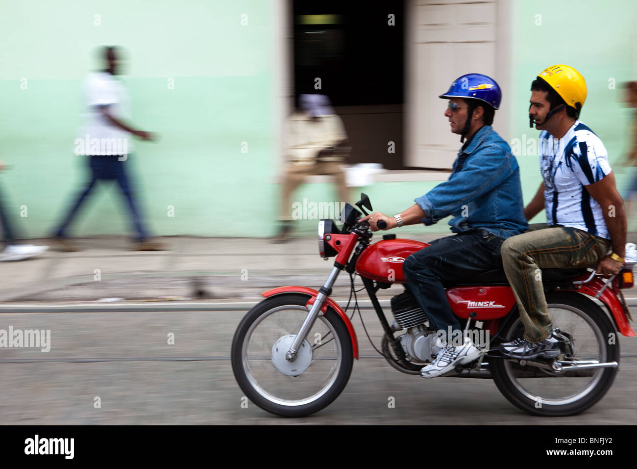 Cuban street scene - riding motorbikes through the Havana streets Stock ...