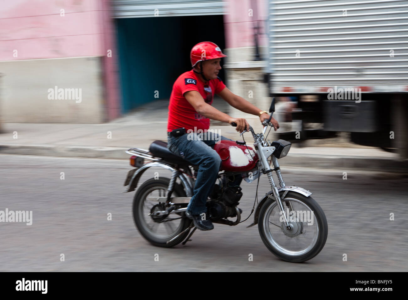Cuban street scene - riding motorbikes through the Havana streets Stock ...