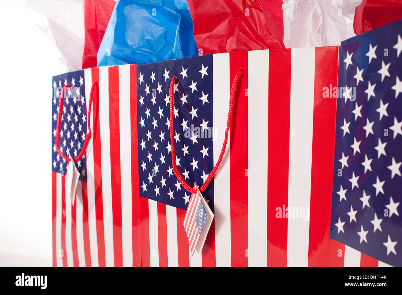 Shopping American Flag gift bags with red,white and blue tissue Stock ...