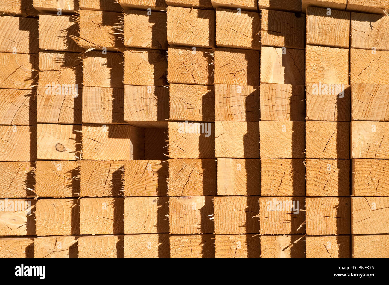 Pre-cut softwood timber planks and studs for new domestic housing ...