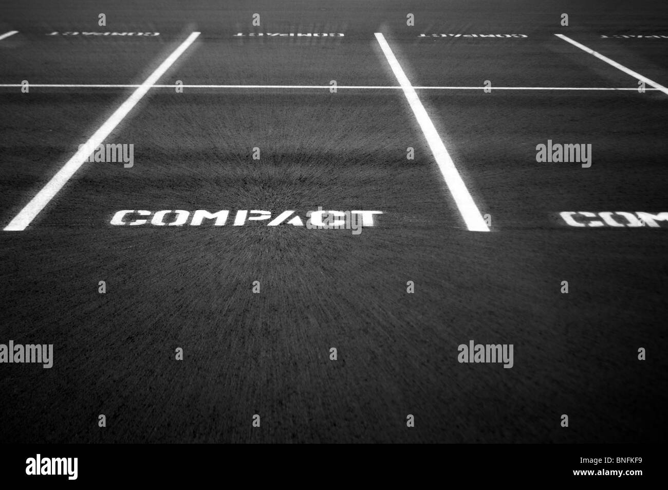 Compact parking lot with a slight zoom effect applied zooming in toward ...