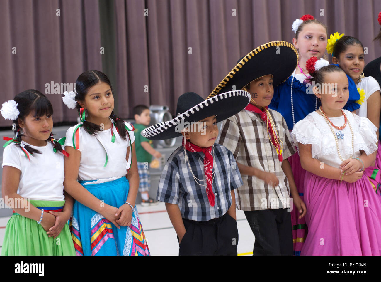 Hispanic children at a celebration at their grade school in Monroe ...