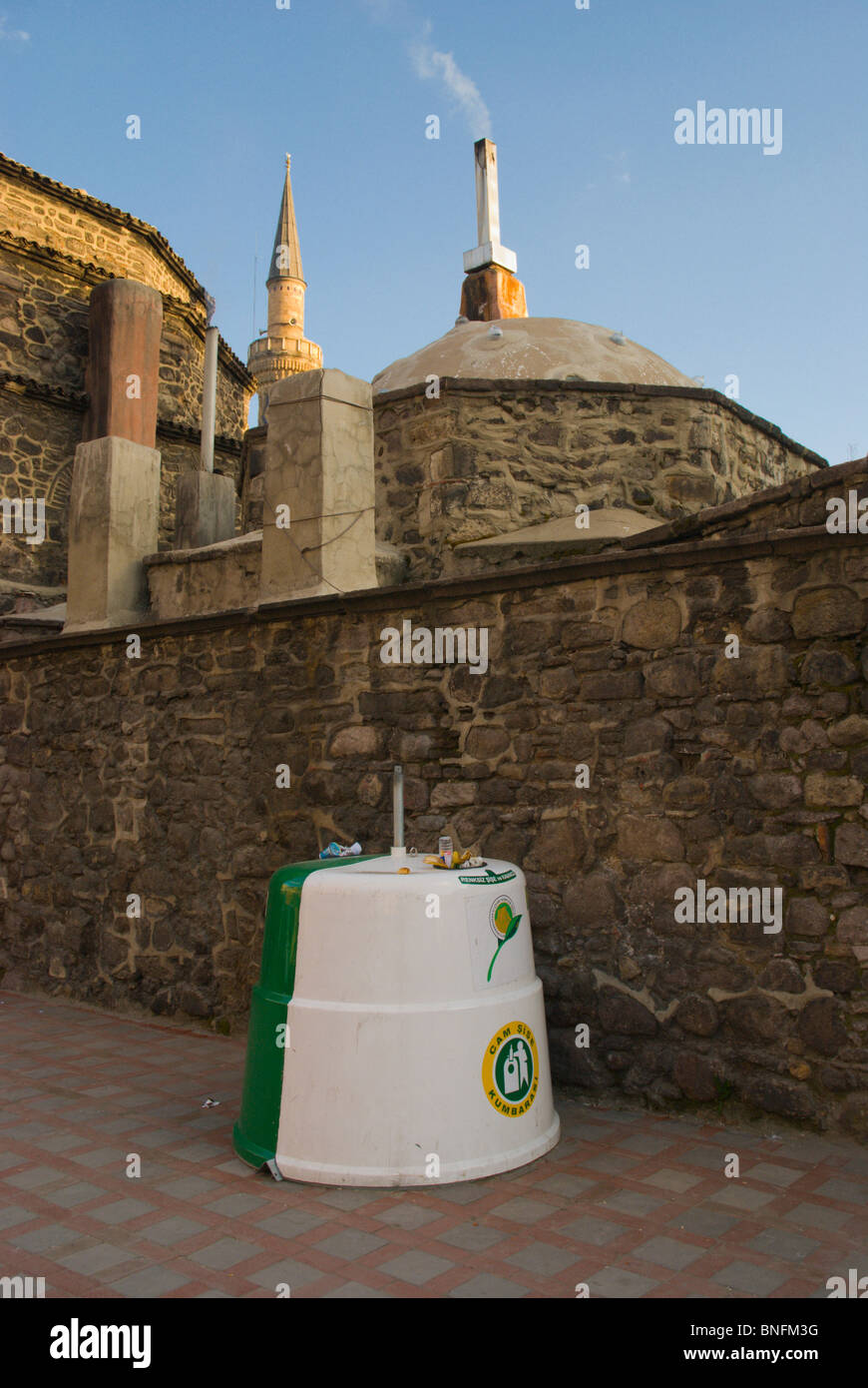 Recycling bins outside Imaret Camii mosque and hamam Afyon western ...