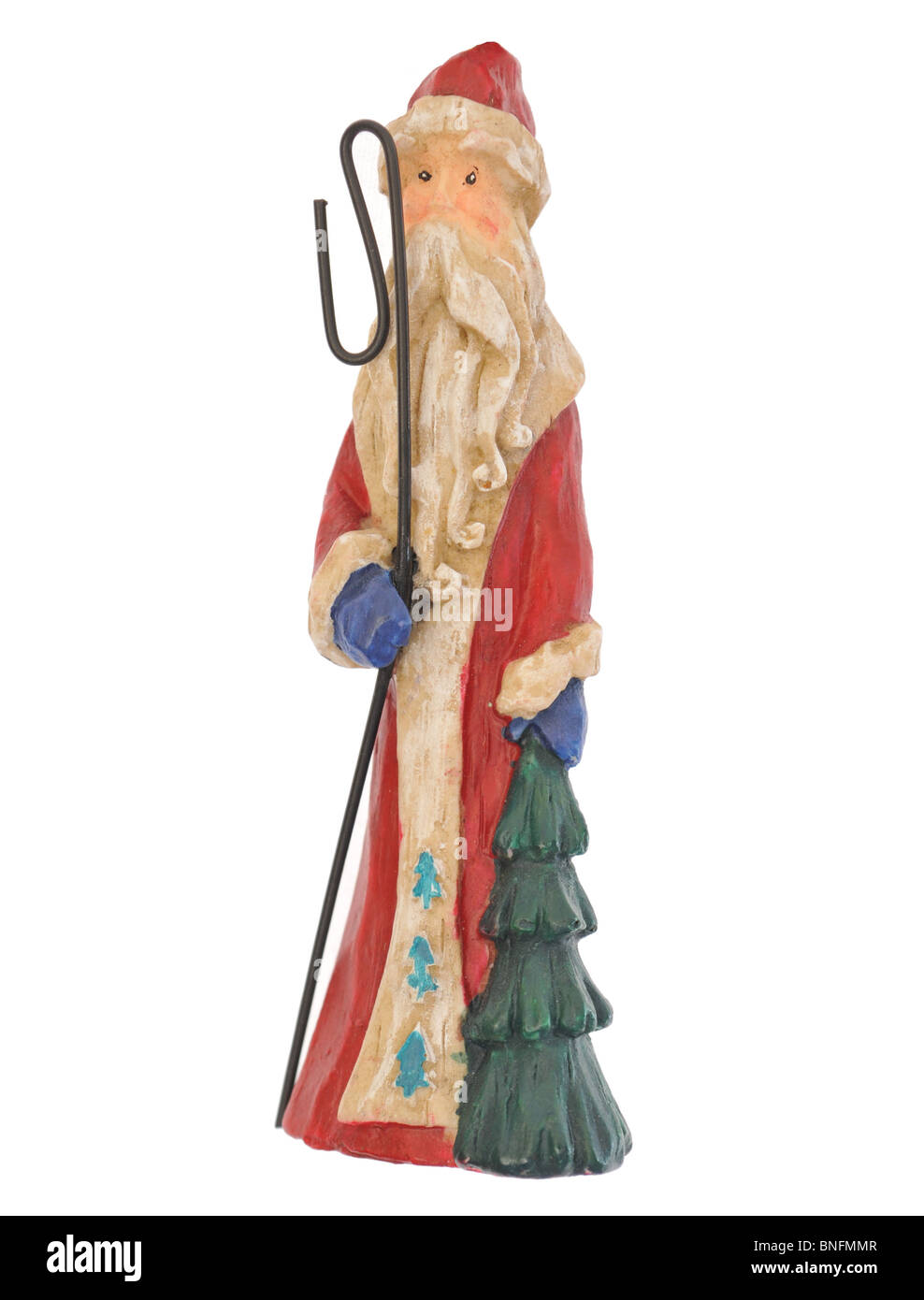 A long miniature of a santa clause. He looks like a wizard because of ...