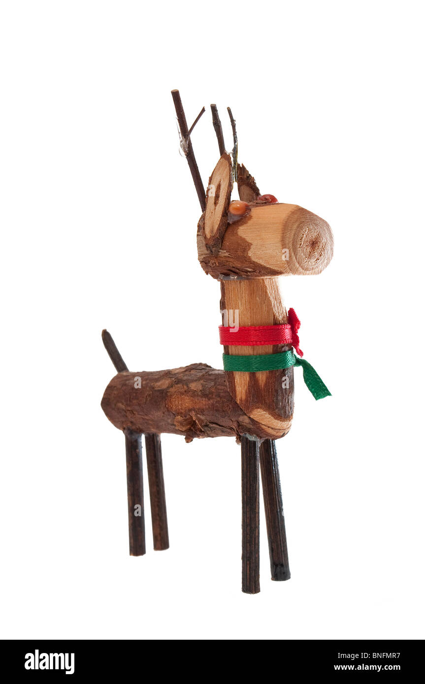 Wood reindeer isolated on white Stock Photo - Alamy