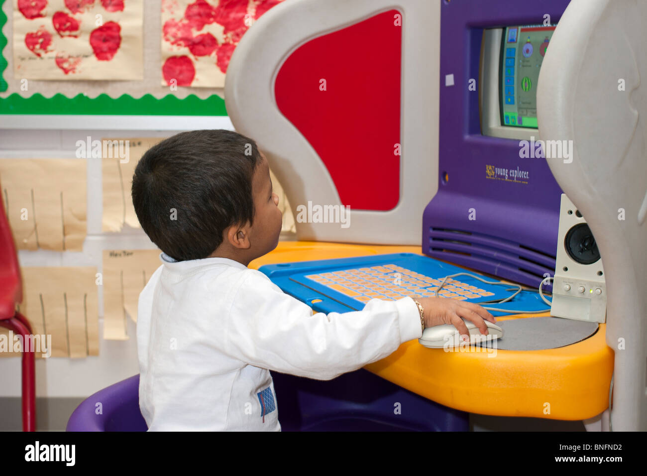 4 year old preschool boy using a computer Stock Photo - Alamy