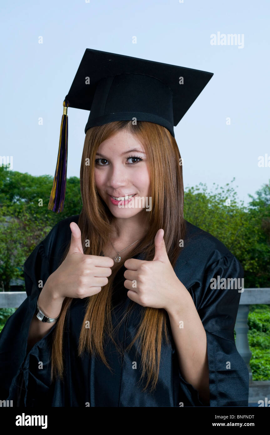 Graduation woman thumbs up isolated hi-res stock photography and images ...