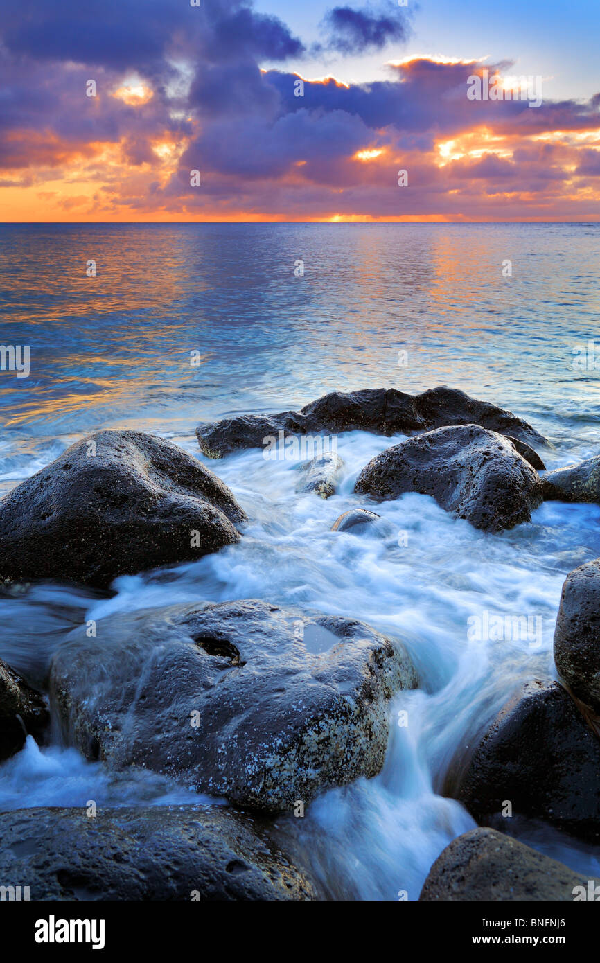Boulders of volcanic rock on beach hi-res stock photography and images ...