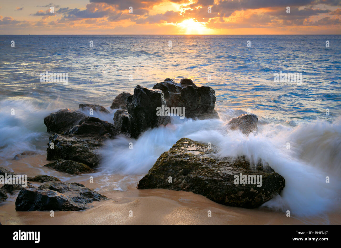 Rocks on Sunset Beach on Oahu, Hawaii Stock Photo - Alamy