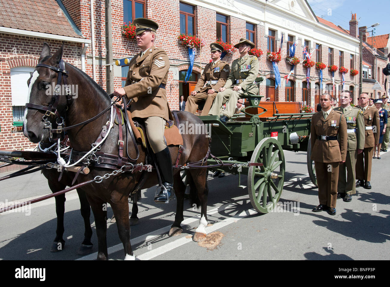 A horse drawn carriage carries the last WW1 soldier to be buried at the ...