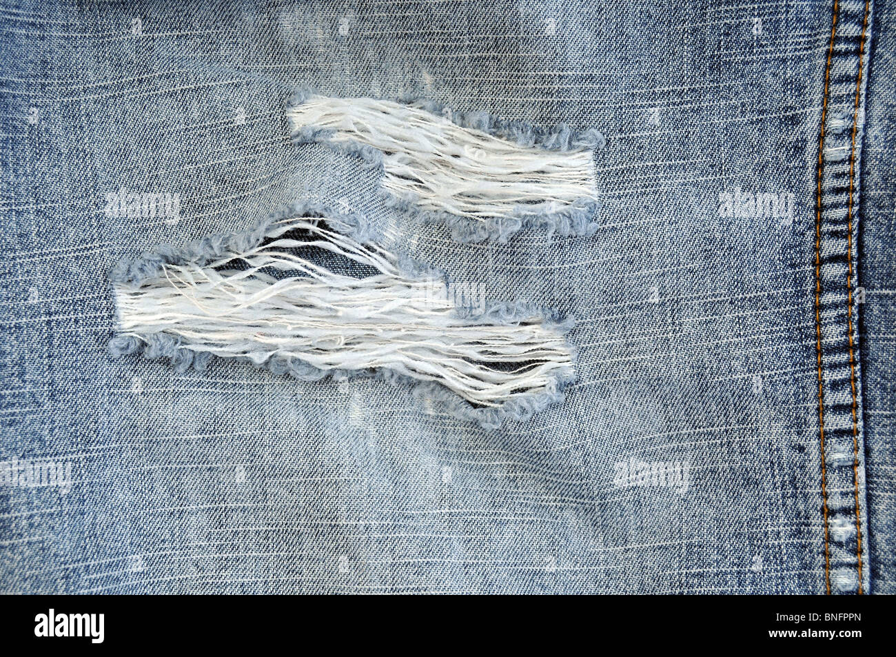 Ripped white fabric hi-res stock photography and images - Alamy