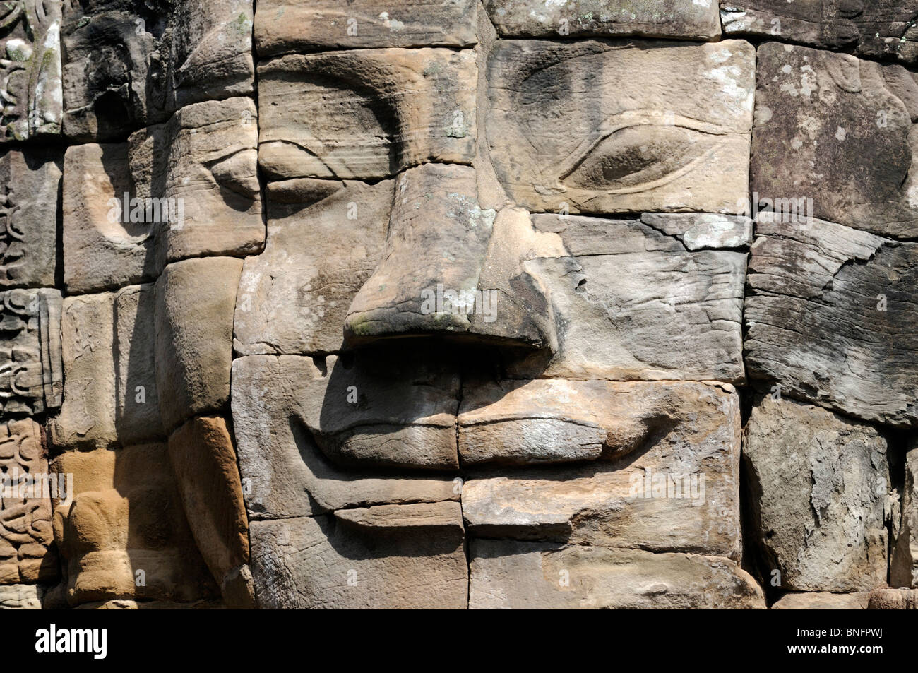 Smiling stone face hi-res stock photography and images - Alamy