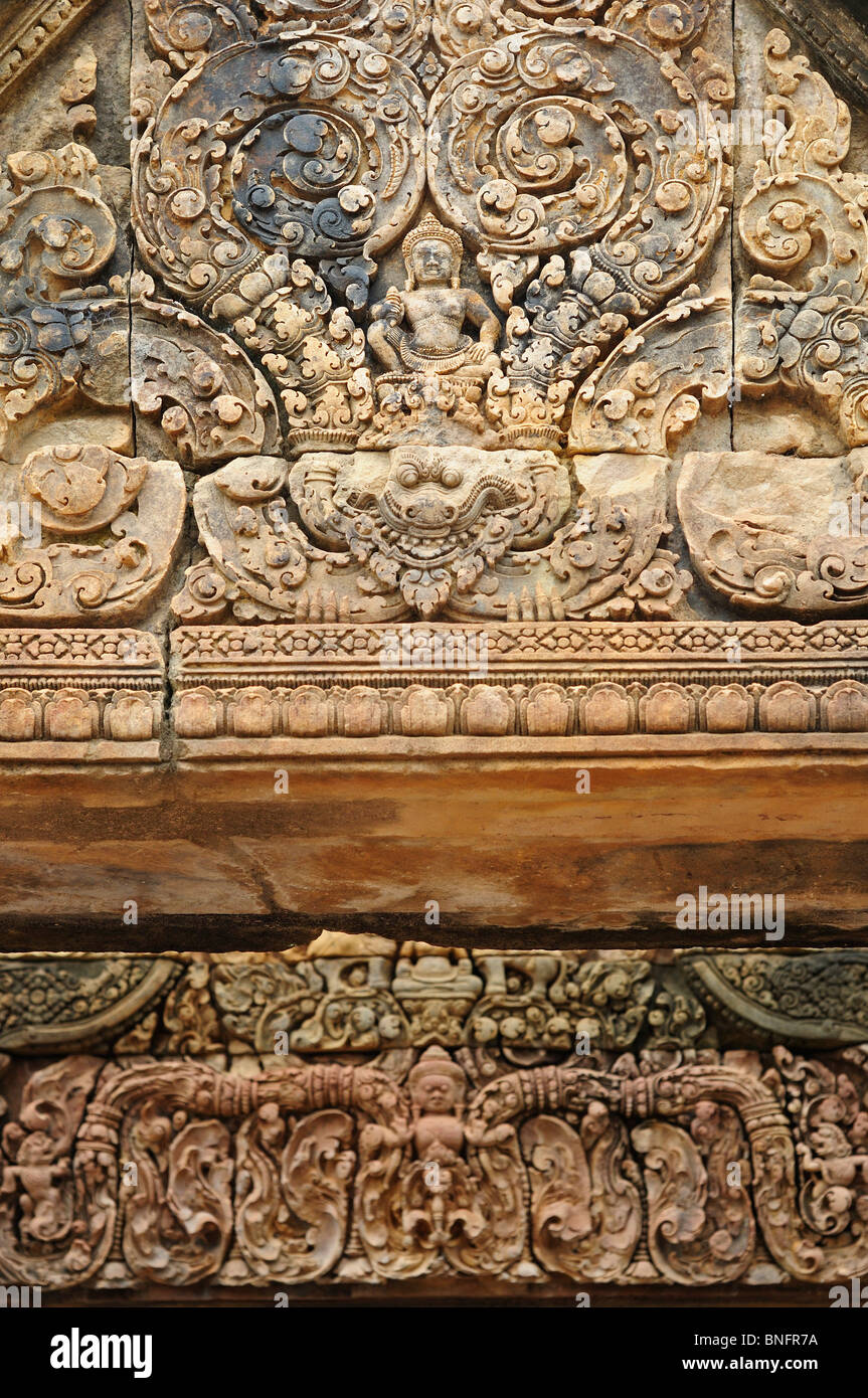 Detailed carvings in red sandstone lintel, Banteay Srei Temple, Angkor ...