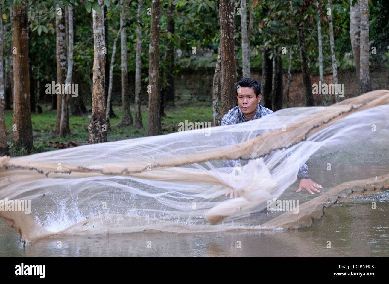 Fisherman casting net, Cambodia Stock Photo - Alamy