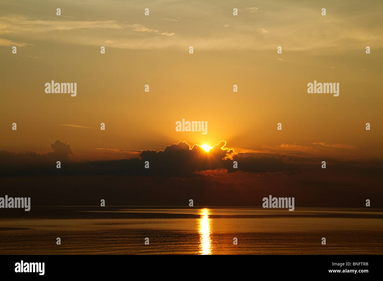 sunset at Sea Stock Photo - Alamy