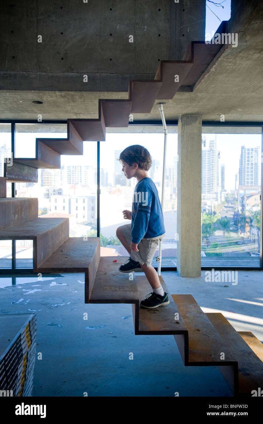 Boy walking up stairs, San Diego, California, USA Stock Photo - Alamy