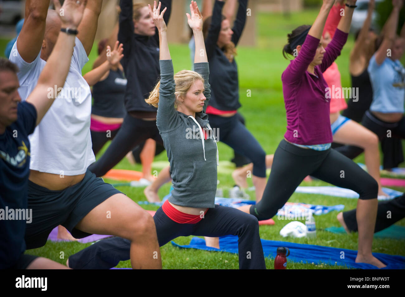 Group practicing yoga hi-res stock photography and images - Alamy