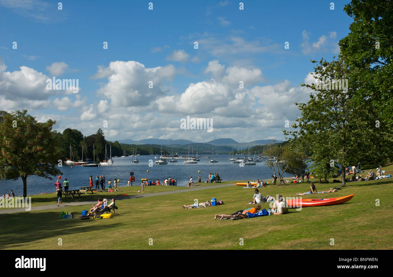 People relaxing at Fell Foot Park, on the shore of Lake Windermere ...