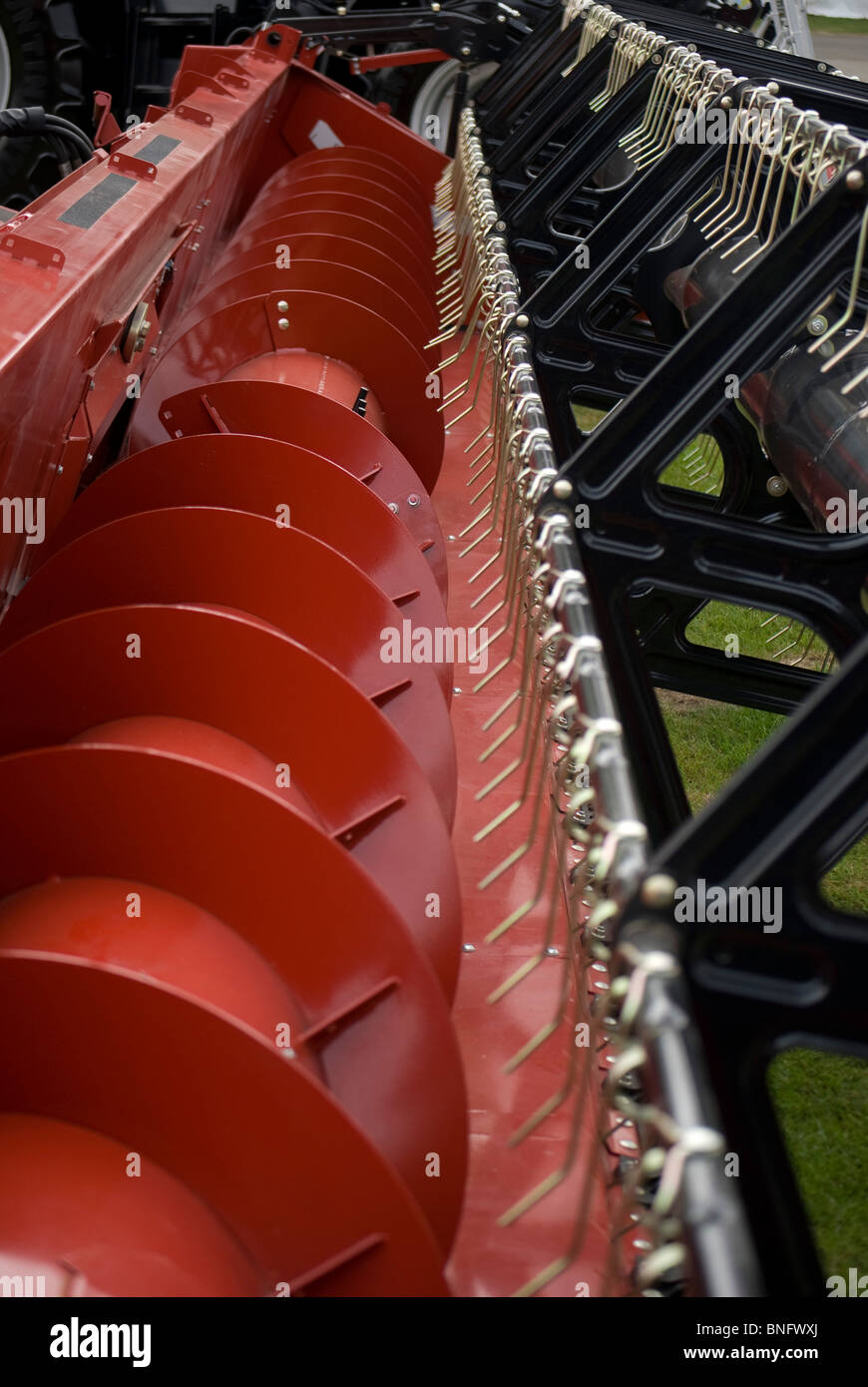 The auger and part of the reel on a combine harvester Stock Photo - Alamy