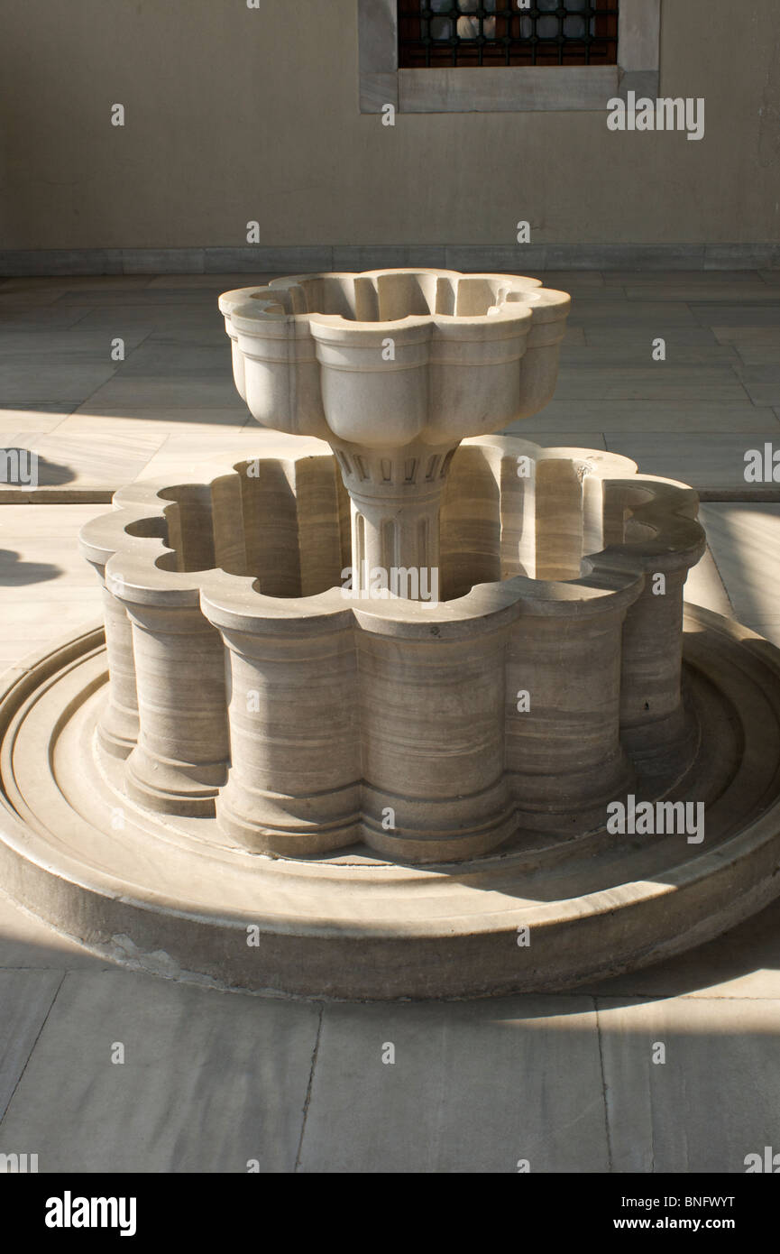 A limestone fountain without water in the Topkapi Palace in Istanbul ...