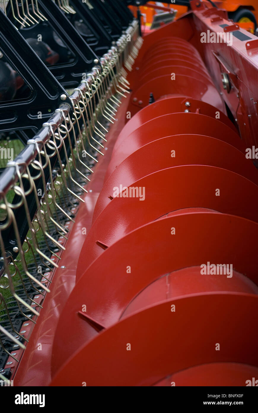 The auger and part of the reel on a combine harvester Stock Photo - Alamy