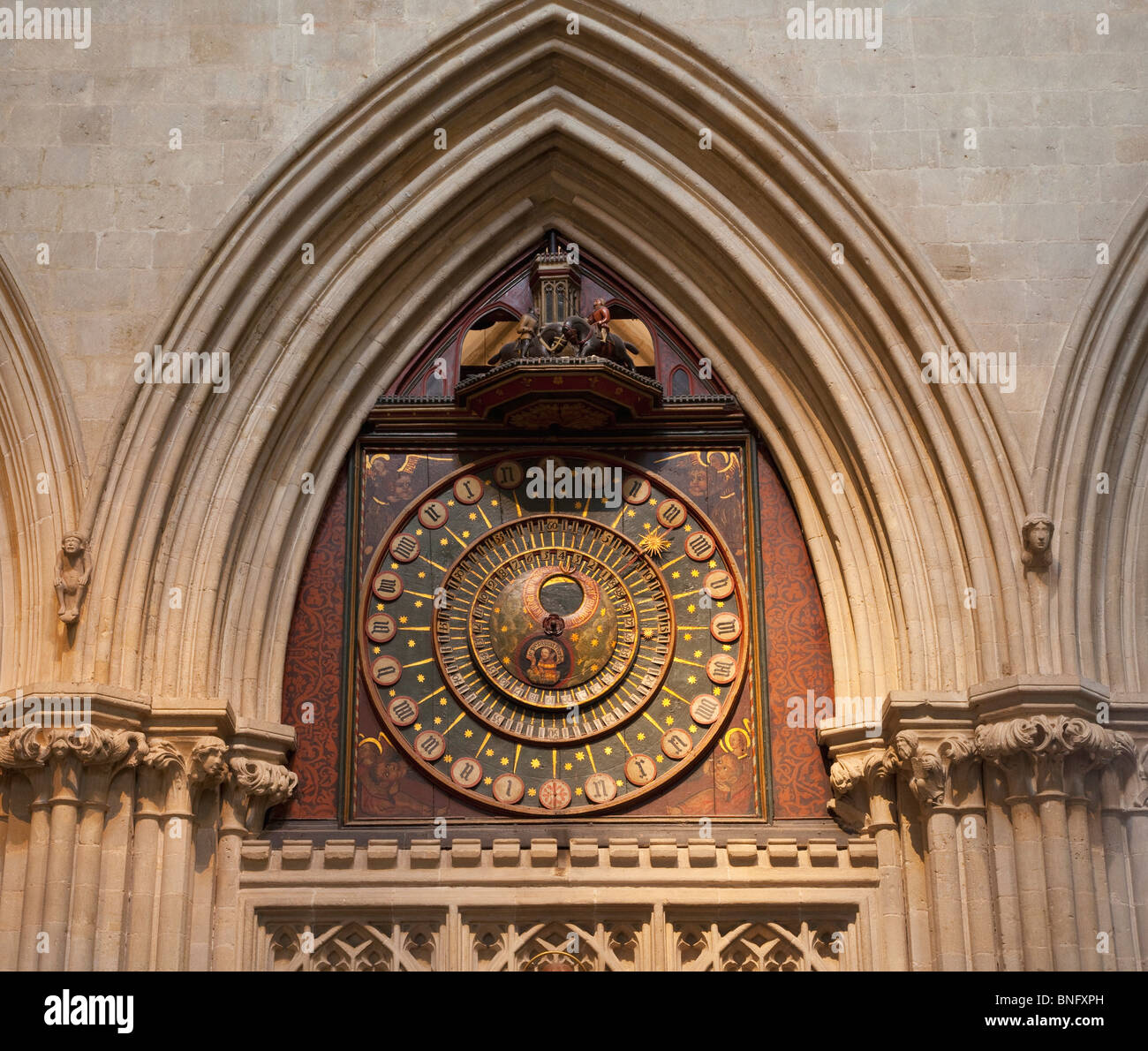 Details of an old clock on the cathedral wall, Wells Cathedral, Wells ...
