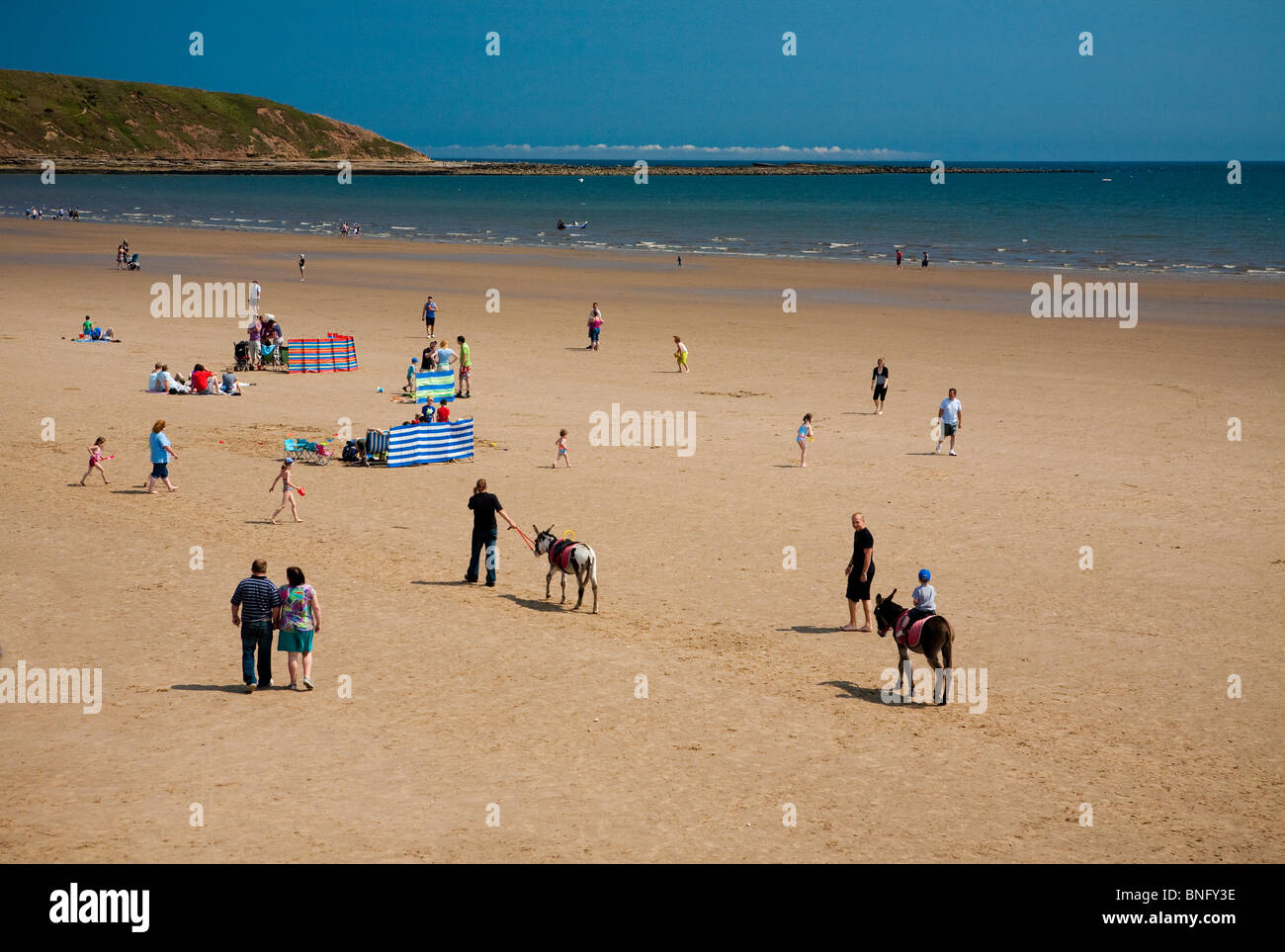 Sun Bathers Enjoying the British Summer on the Beach in the Resort of ...