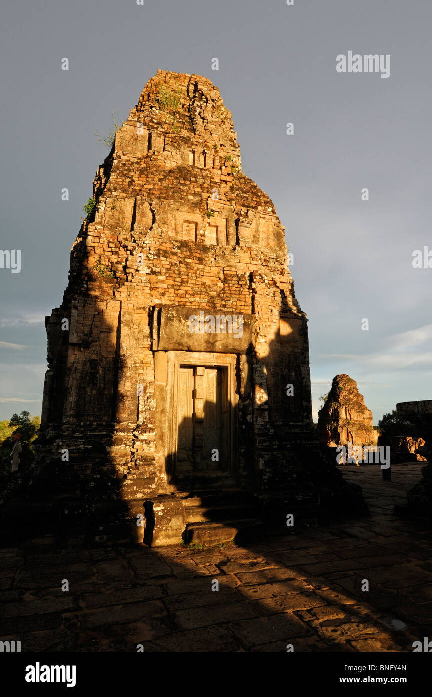Stone tower of Ta Keo Temple lit by setting sun, Angkor, Cambodia Stock ...