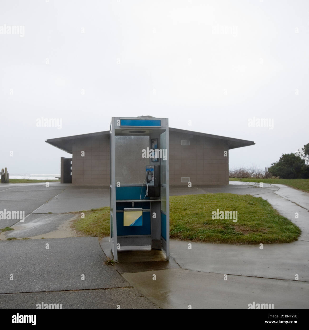 Telephone booth in front of a building Stock Photo - Alamy