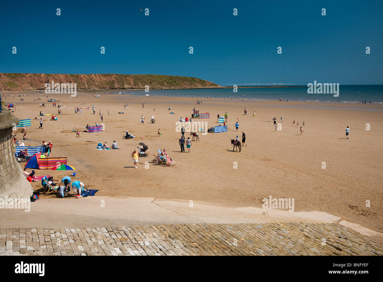 Sun Bathers Enjoying the British Summer on the Beach in the Resort of ...