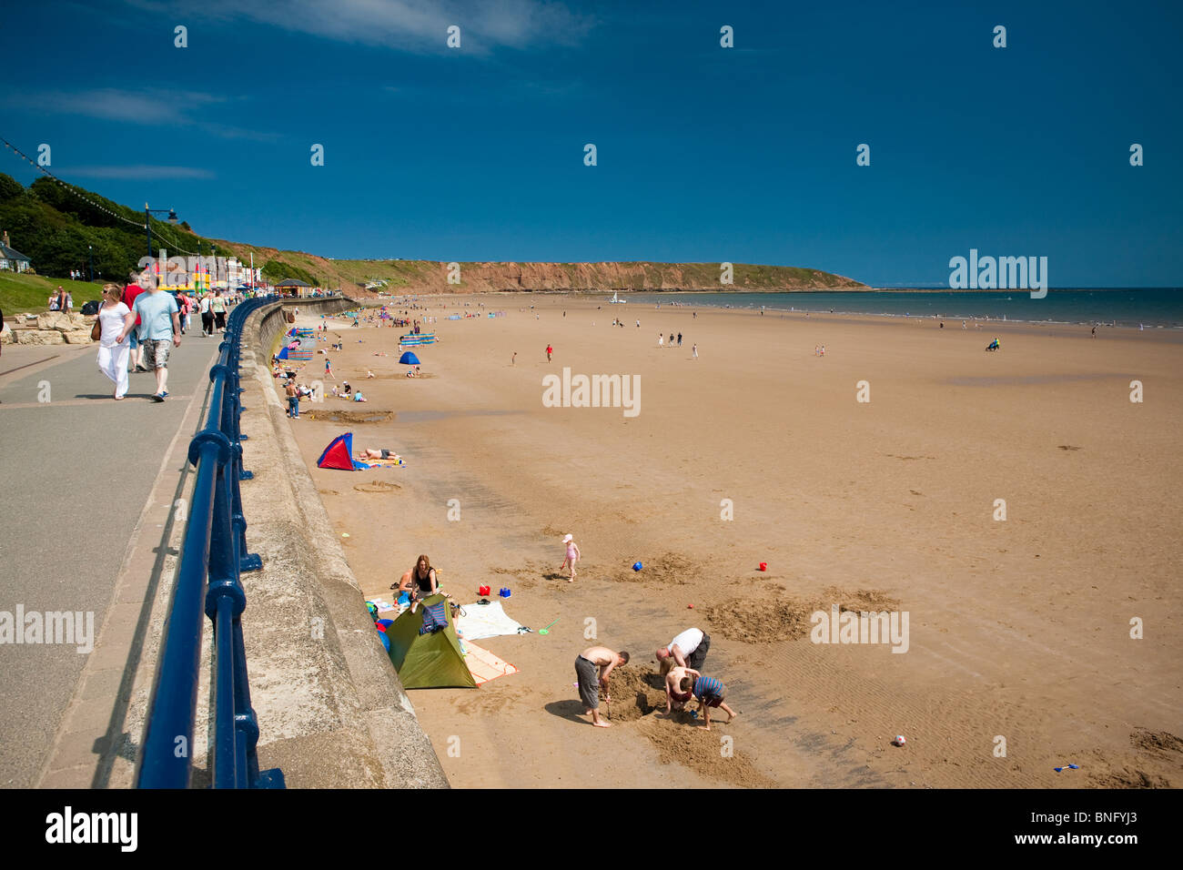 Sun Bathers Enjoying the British Summer on the Beach in the Resort of ...