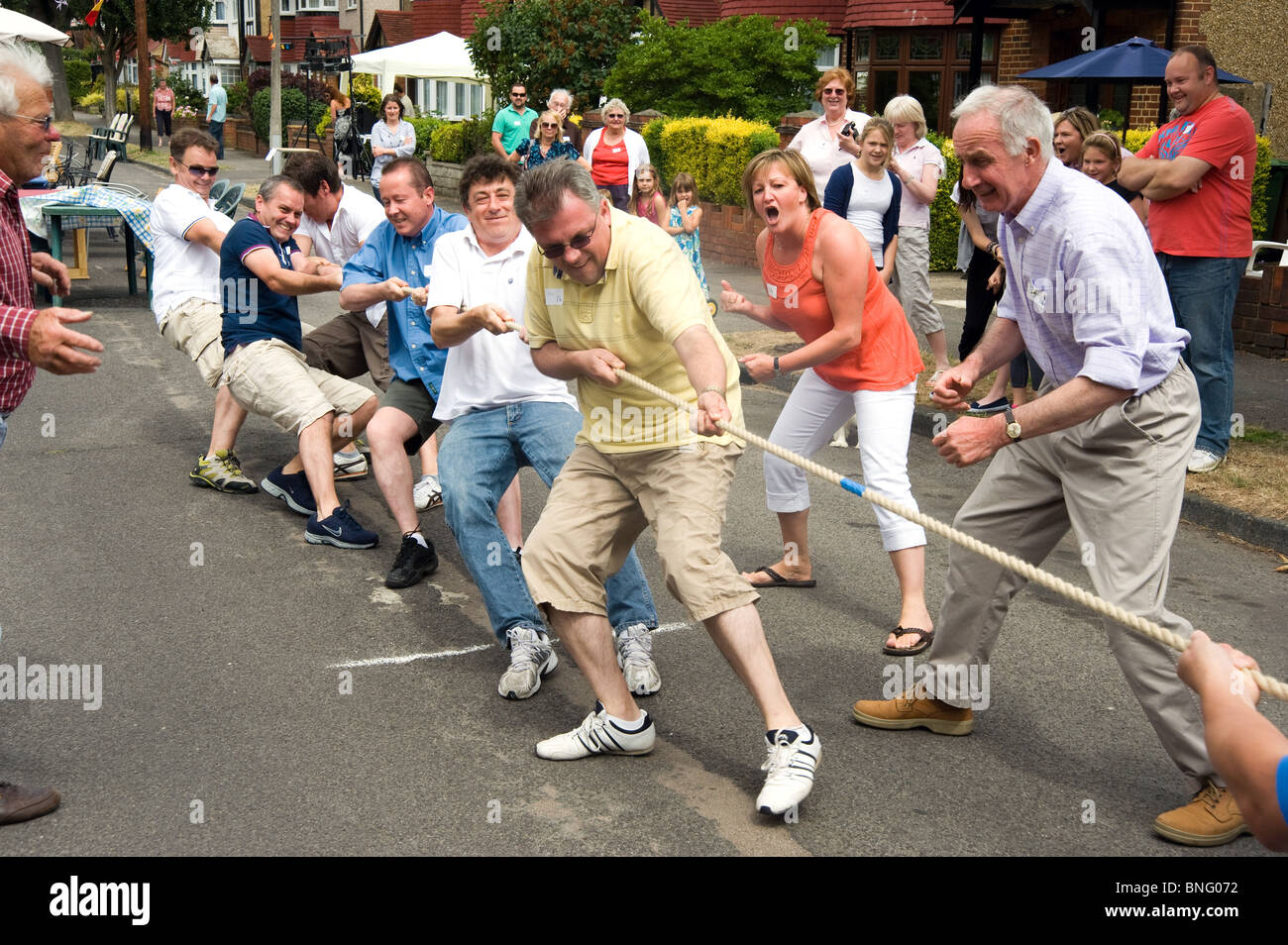 Big men tug of war hi-res stock photography and images - Alamy